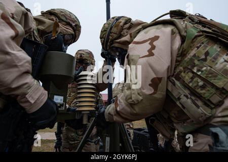 Airmen assigned to the 3d Weather Squadron set up a tactical ...