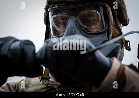 Airmen assigned to the 3d Weather Squadron set up a tactical ...