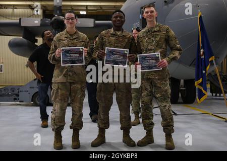 Crew members with the 4th Special Operations Squadron pose in front of ...