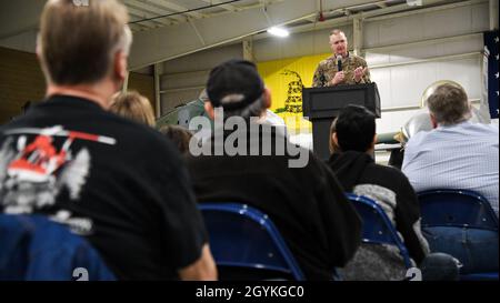 Col. Jon Eberlan, 75th Air Base Wing commander, presents retired Air ...