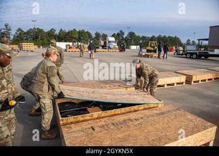 FORT BENNING, Ga. – At Fort Benning Jan. 21, work crews use forklifts ...