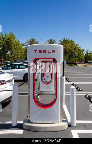 Brea, CA, USA – August 1, 2021: A white Tesla charging at Tesla ...