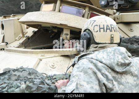 Army M1 Abrams tank gunner performs a remote-fire procedure Stock Photo ...
