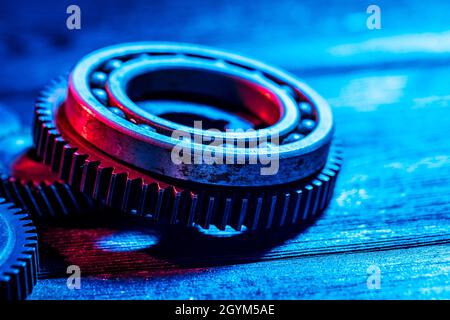 Gears. Machine part. Neon color Stock Photo - Alamy