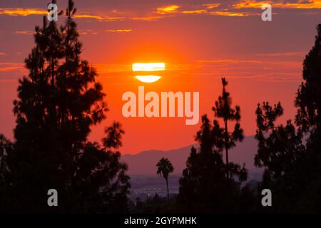 A perfect summer sunset in California, Beverly Hills, relaxing under ...