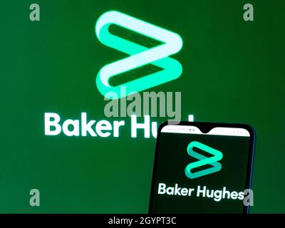 In this photo illustration, a Baker Hughes logo is seen displayed on a ...