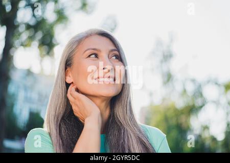 Photo of dreamy thoughtful lady wear striped sweater spectacles holding ...
