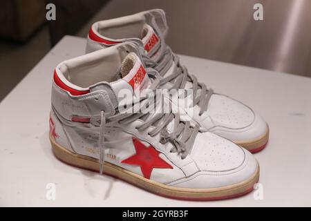 SHOES ON DISPLAY AT GOLDEN GOOSE FASHION STORE Stock Photo - Alamy