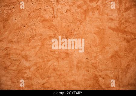 Terracotta colored plaster wall, rustic background or texture Stock ...