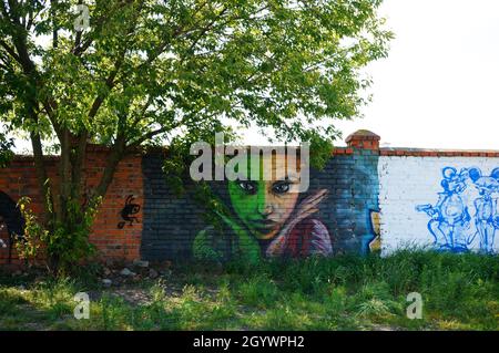 POZNAN, POLAND - Aug 02, 2015: A close-up shot of graffiti drawings and ...
