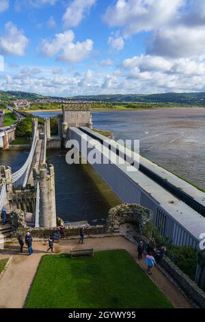 the modern tower and concealed train line at conwy castle next to the ...