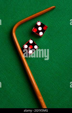 Pair of Dice on green felt table Stock Photo - Alamy