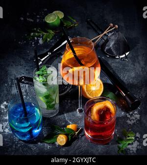 Cocktails assortment served on dark background. Classic drink menu ...