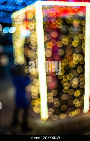 Big yellow abstract bokeh made from Christmas lights on black ...