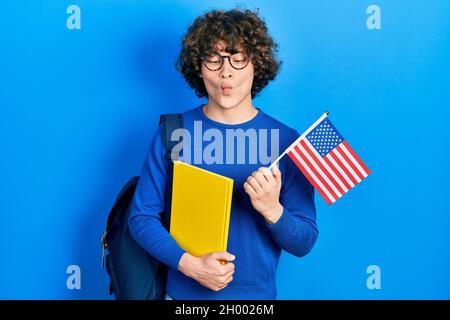 Person holding USA flag lips shape card Stock Photo - Alamy