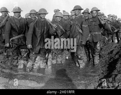 British soldiers in muddy trenches, First World War. British Army ...