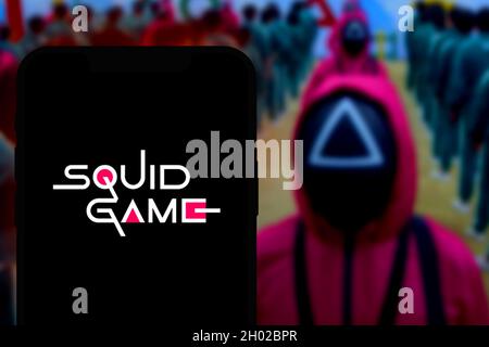 Smartphone with the logo of "The Squid Game" (Hangul: 오징어 게임; RR ...