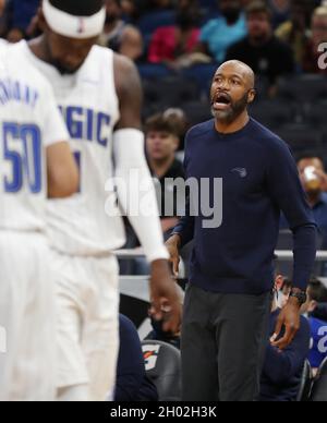 Orlando Magic head coach Jamahl Mosley, right, argues with official ...