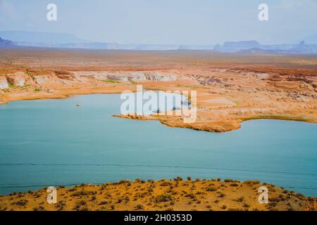Lake Powell overlook. Morred boats, blue water, and red rocks, Southern ...
