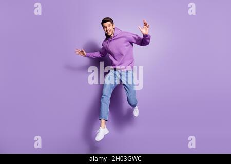 Full body photo of energetic cheerful girl jump have good mood rejoice ...