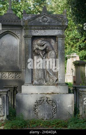 figure of woman carved on gravestone Stock Photo - Alamy