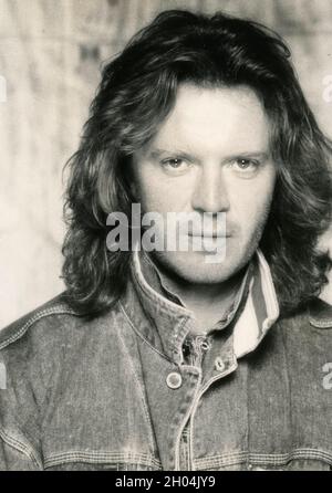 The Italian singer-songwriter Umberto Tozzi posing and staring at the ...
