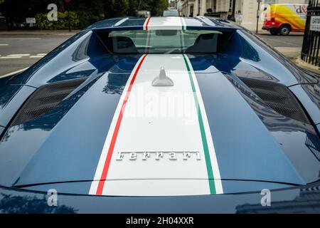 London- October 2021: A blue Ferrari parked on upmarket London street ...