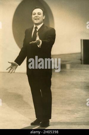 Italian singer and actor Claudio Villa (left), 1970s Stock Photo - Alamy