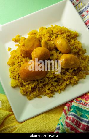 Detail of a rice dish with pequi Stock Photo - Alamy