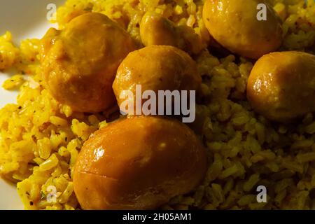 Detail of a rice dish with pequi Stock Photo - Alamy