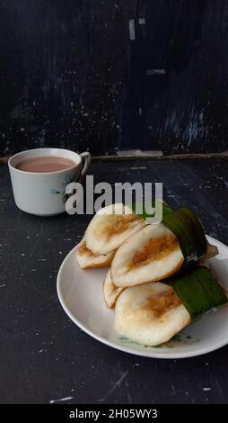 Vertical shot of a mini burger on a board Stock Photo - Alamy