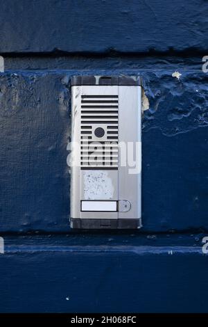 Intercom on a block of flats entrance door Stock Photo - Alamy