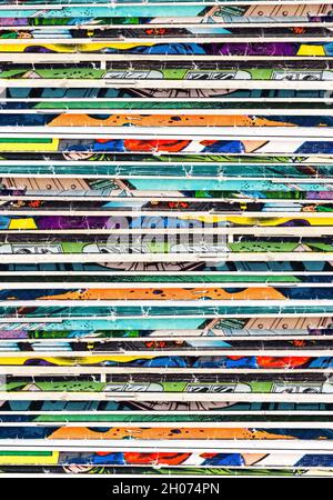 Old faded comic book collection stacked in a pile creates a colorful ...