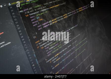 Javascript NodeJs Hello World code on screen blurry background image ...