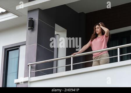 Covid-19 and lifestyle concept. Confused girl in face mask looking at ...