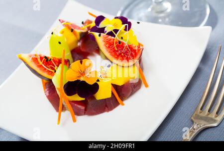 Tuna tartare with figs, cucumber Stock Photo - Alamy