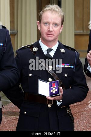 In this file photo, Lt. Col. Michael Baker, left, commander of the 62nd ...