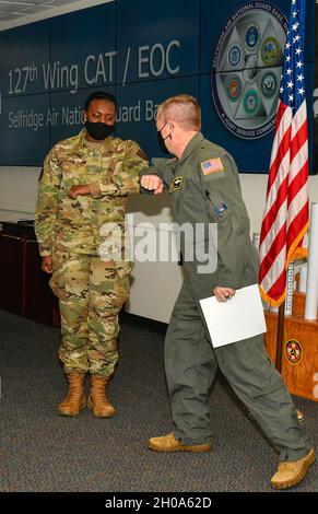 127th Wing Commander Brigadier General Mammen promotes Airman Sydney ...