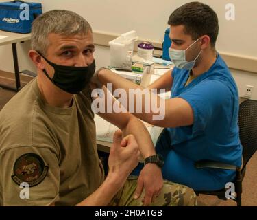 Womack Army Medical Center Commander, Col. David Zinnante congratulates ...