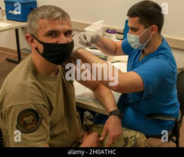 Womack Army Medical Center Commander, Col. David Zinnante congratulates ...