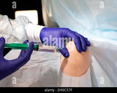 Hand intra articular injection Stock Photo - Alamy