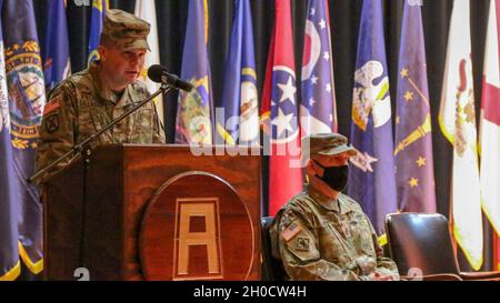 Command Sgt. Maj. Raymond J. Ramirez, accepts the colors from Col ...