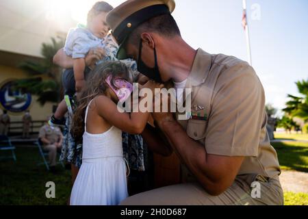 SANTA RITA, Guam (Jan. 29, 2021) Capt. Bret Grabbe (left), commodore of ...