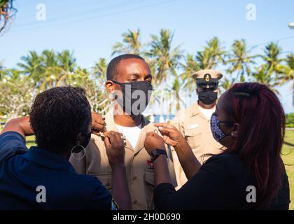 SANTA RITA, Guam (Jan. 29, 2021) Capt. Bret Grabbe (left), commodore of ...