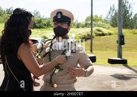 SANTA RITA, Guam (Jan. 29, 2021) Capt. Bret Grabbe (left), commodore of ...