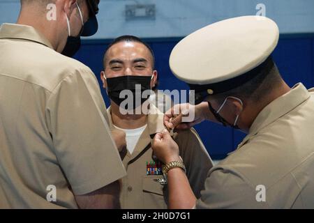 SANTA RITA, Guam (Jan. 29, 2021) Capt. Bret Grabbe (left), commodore of ...