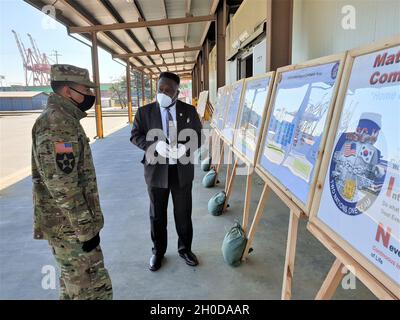 Col. Wheeler R. Manning, brigade commander, 403rd AFSB, passes the ...