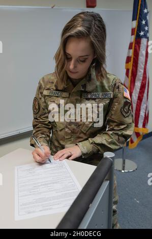 Members of the 607th Air Operations Center render a first salute to Col ...