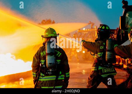 U.S. Marine Corps aircraft rescue and firefighting (ARFF) specialists ...
