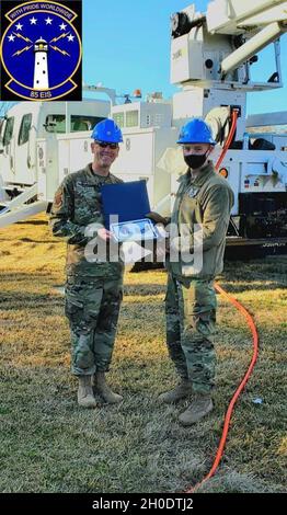 An airman with the 85th Engineering and Installation Squadron, 38th ...